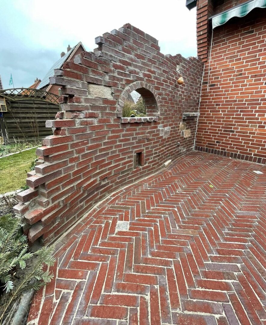 Trockenmauer/Naturstein • Woltjen Garten- und Landschaftsbau